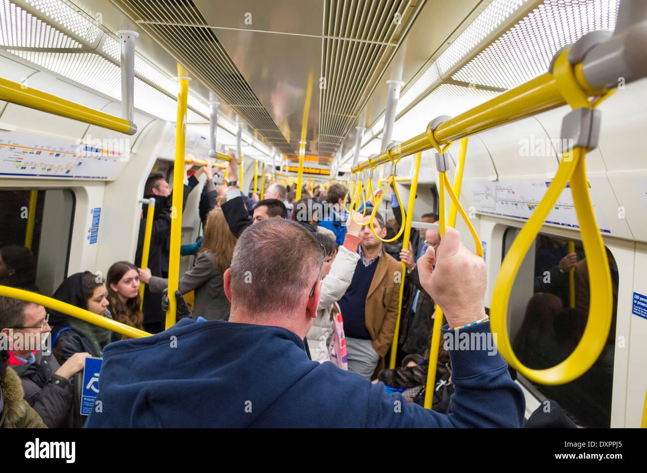 Passengers on Circle Line carriage of London Underground train, England ...