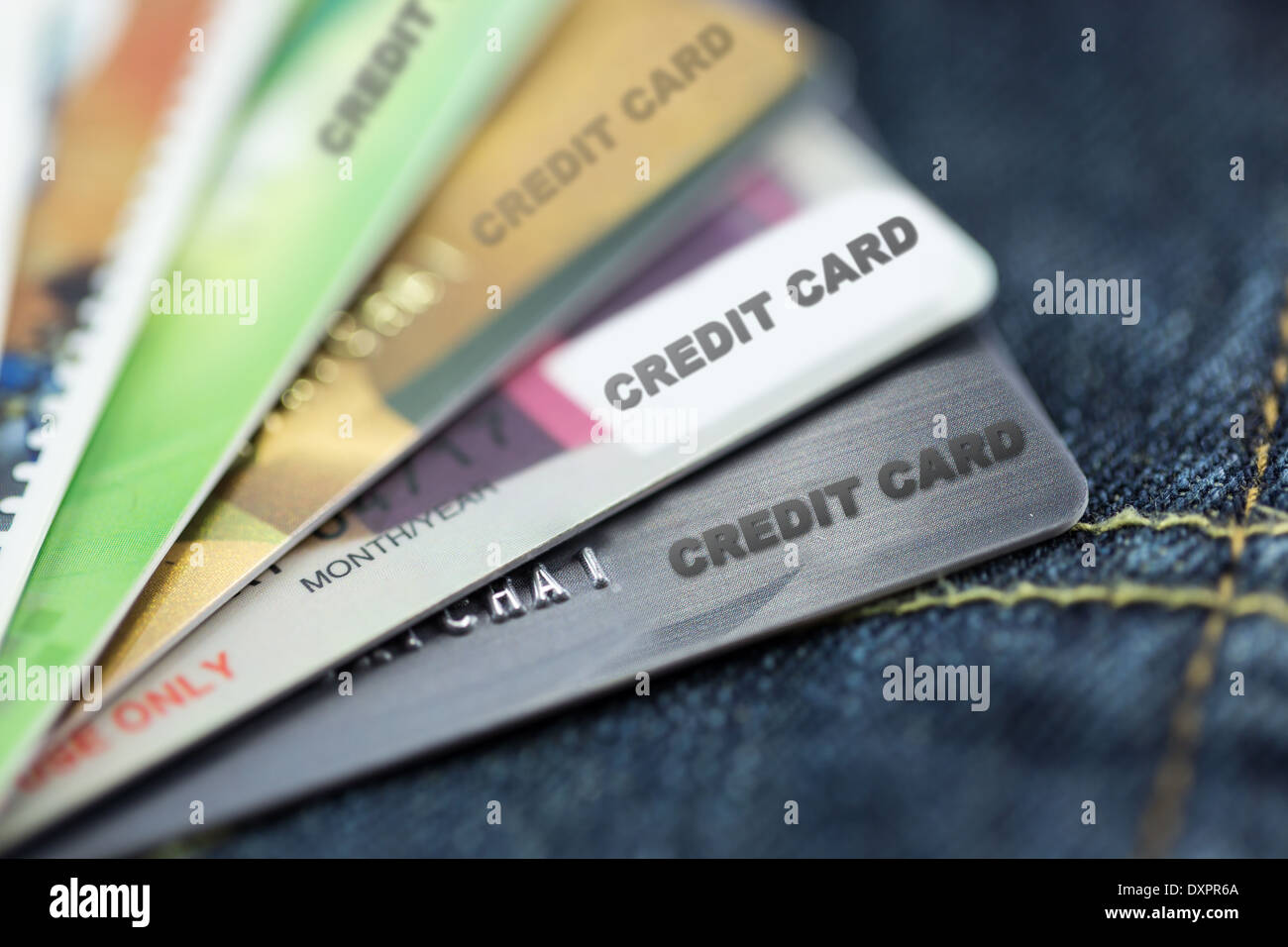 credit cards on jeans focus at first card Stock Photo - Alamy