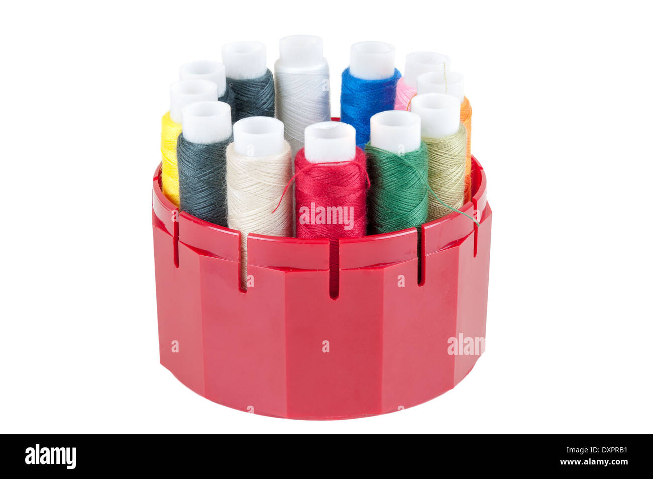 Colored spools of threads in a box isolated on white background Stock ...