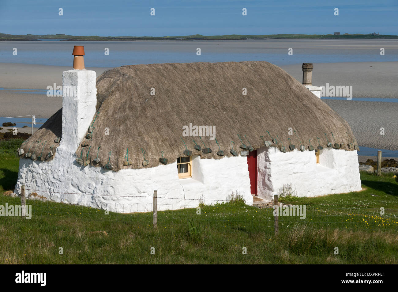 Turf roofed croft house near Malacleit, North Uist, Western Isles ...