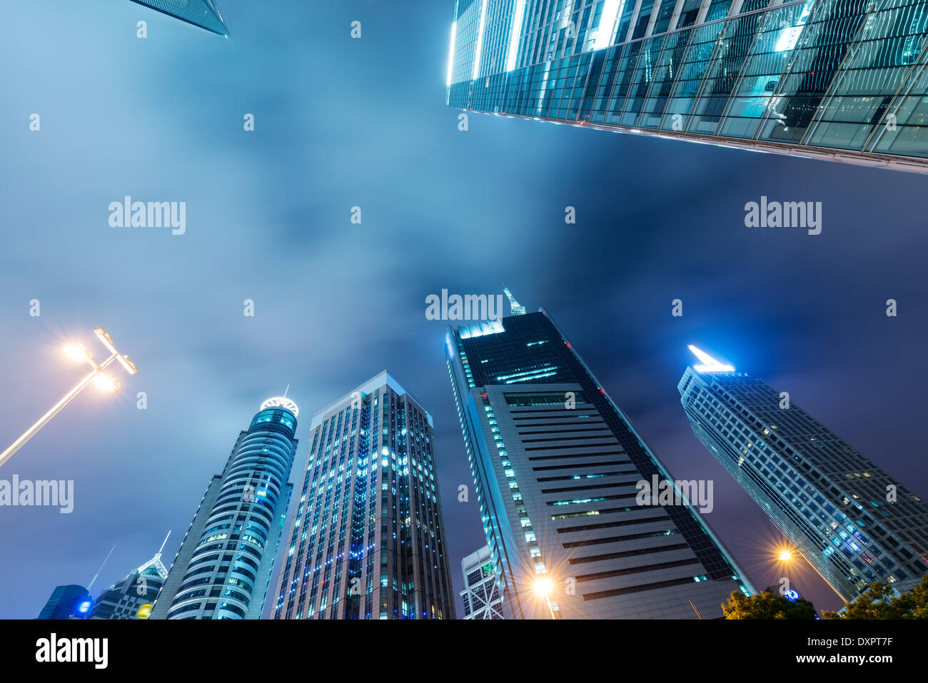 The light trails on the modern building background in shanghai china ...