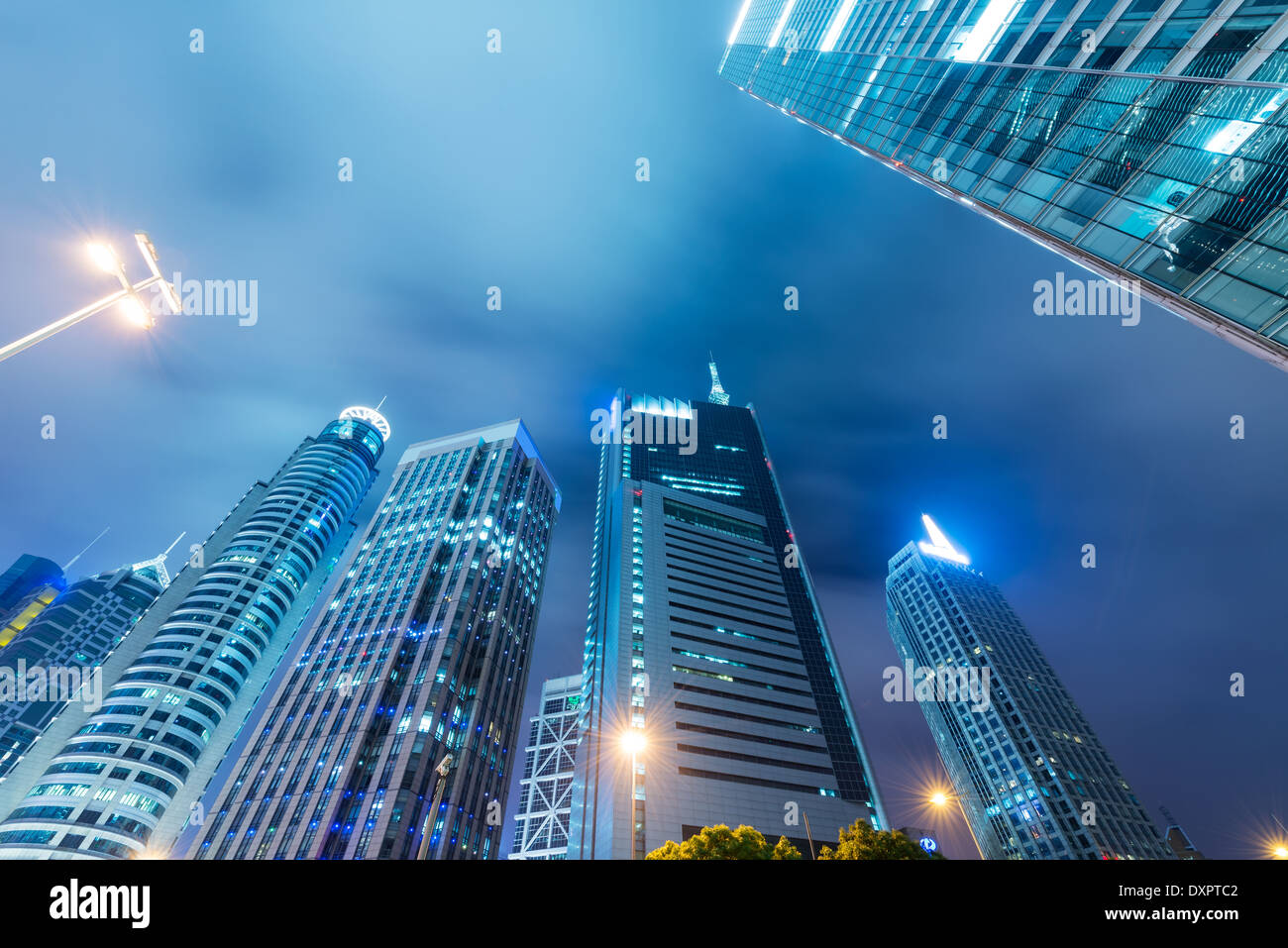 The light trails on the modern building background in shanghai china ...