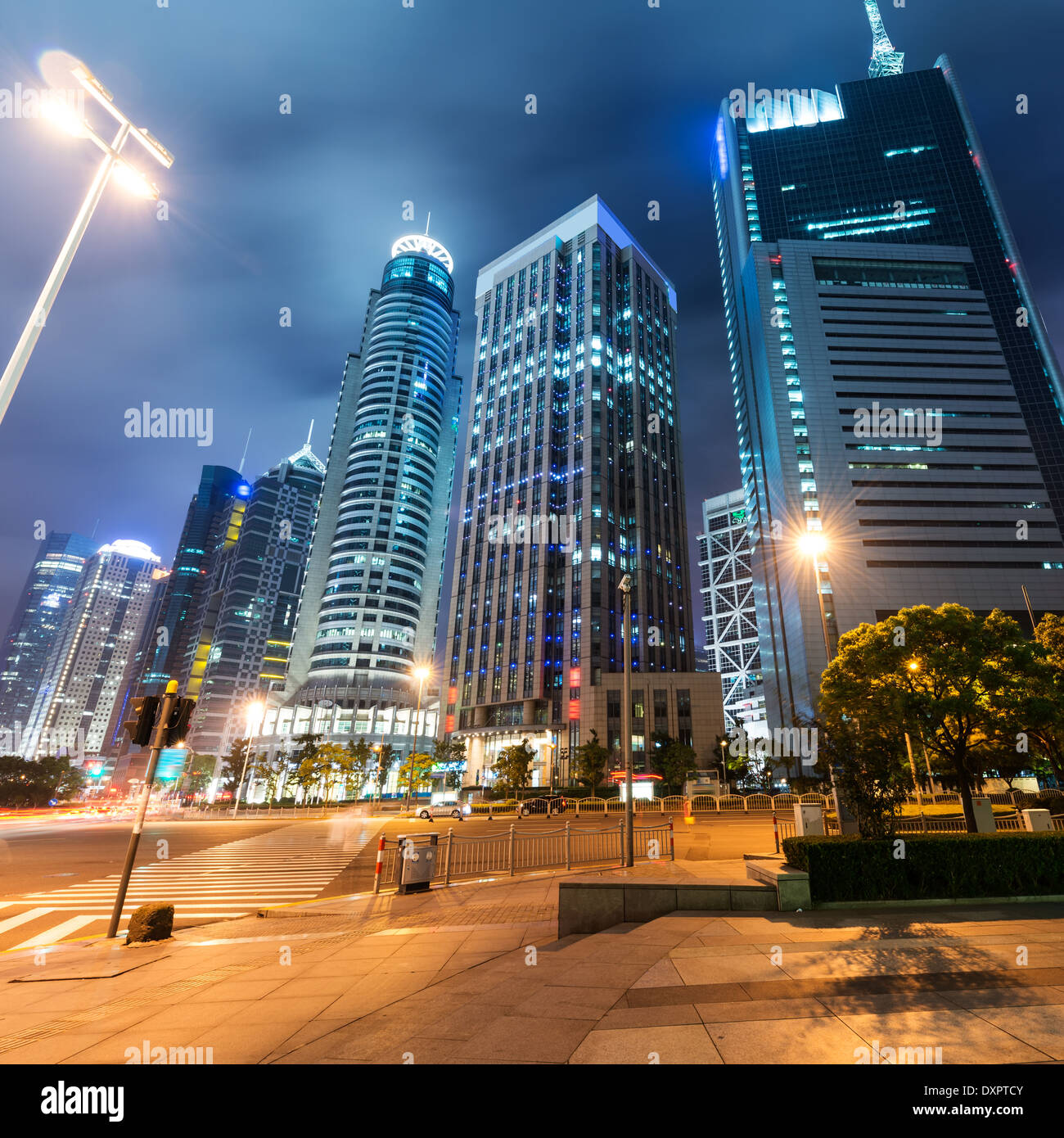 The light trails on the modern building background in shanghai china ...