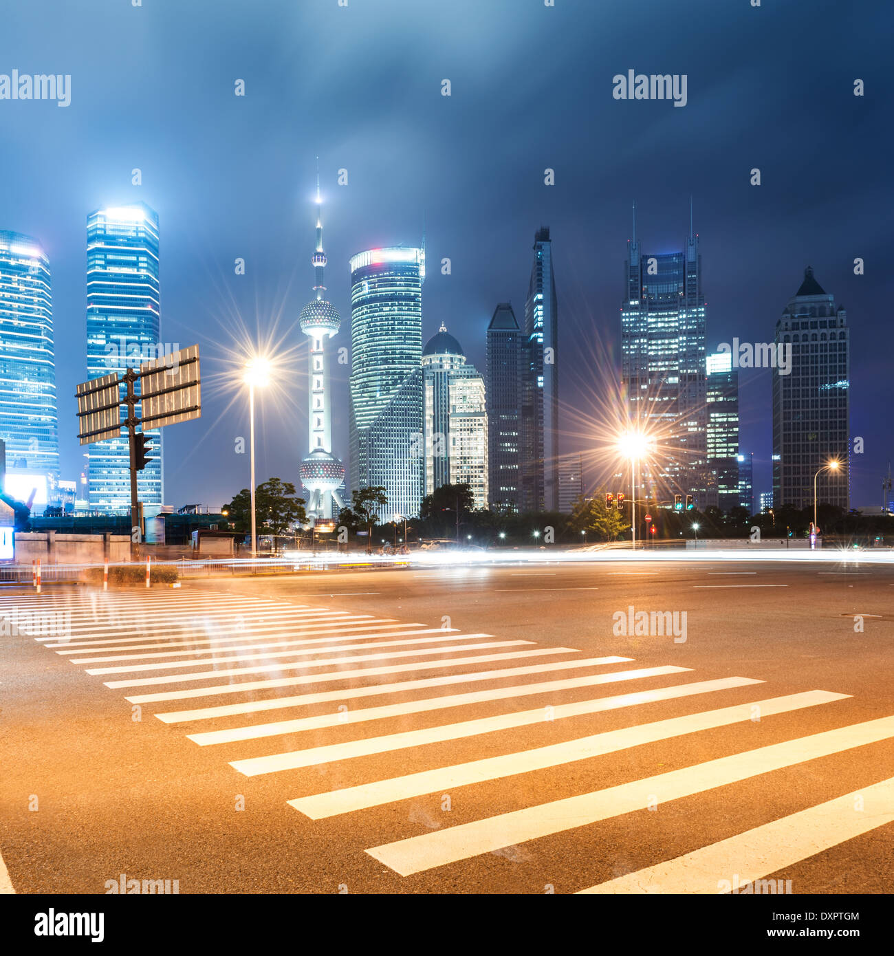 The light trails on the modern building background in shanghai china ...