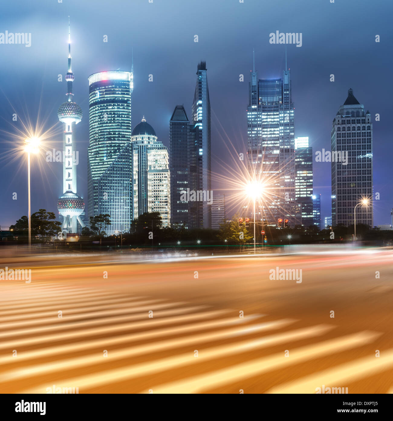 The light trails on the modern building background in shanghai china ...