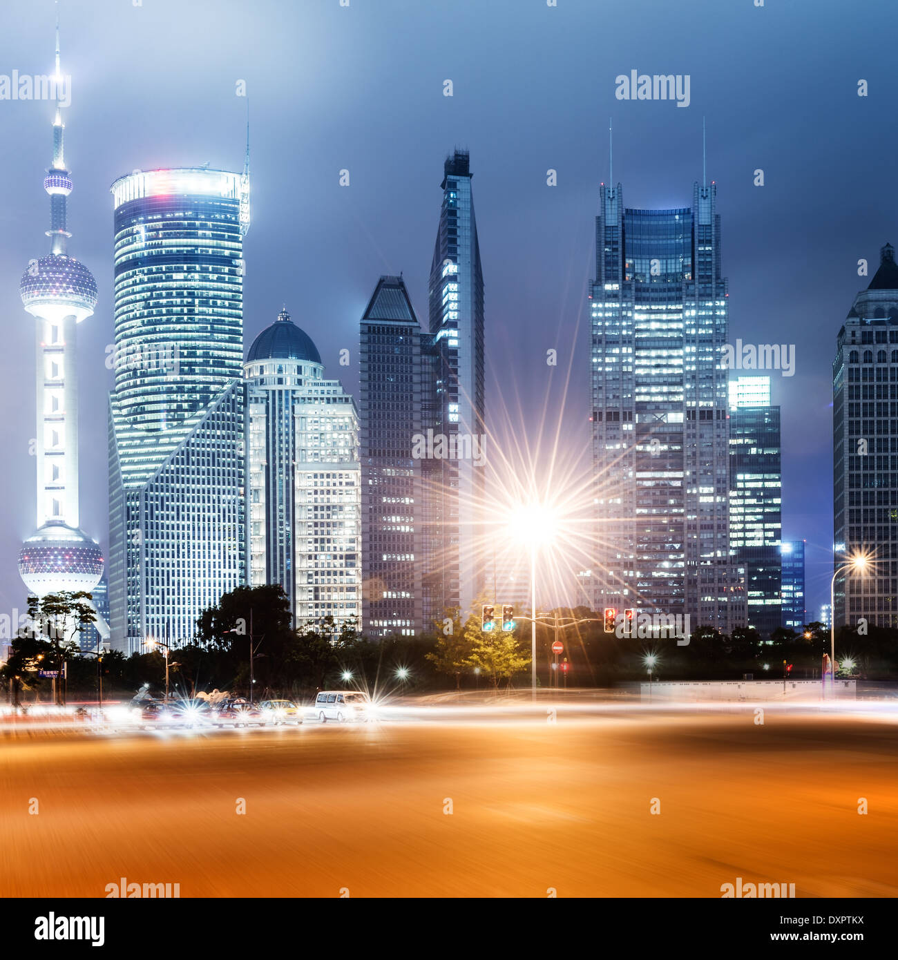 The light trails on the modern building background in shanghai china ...