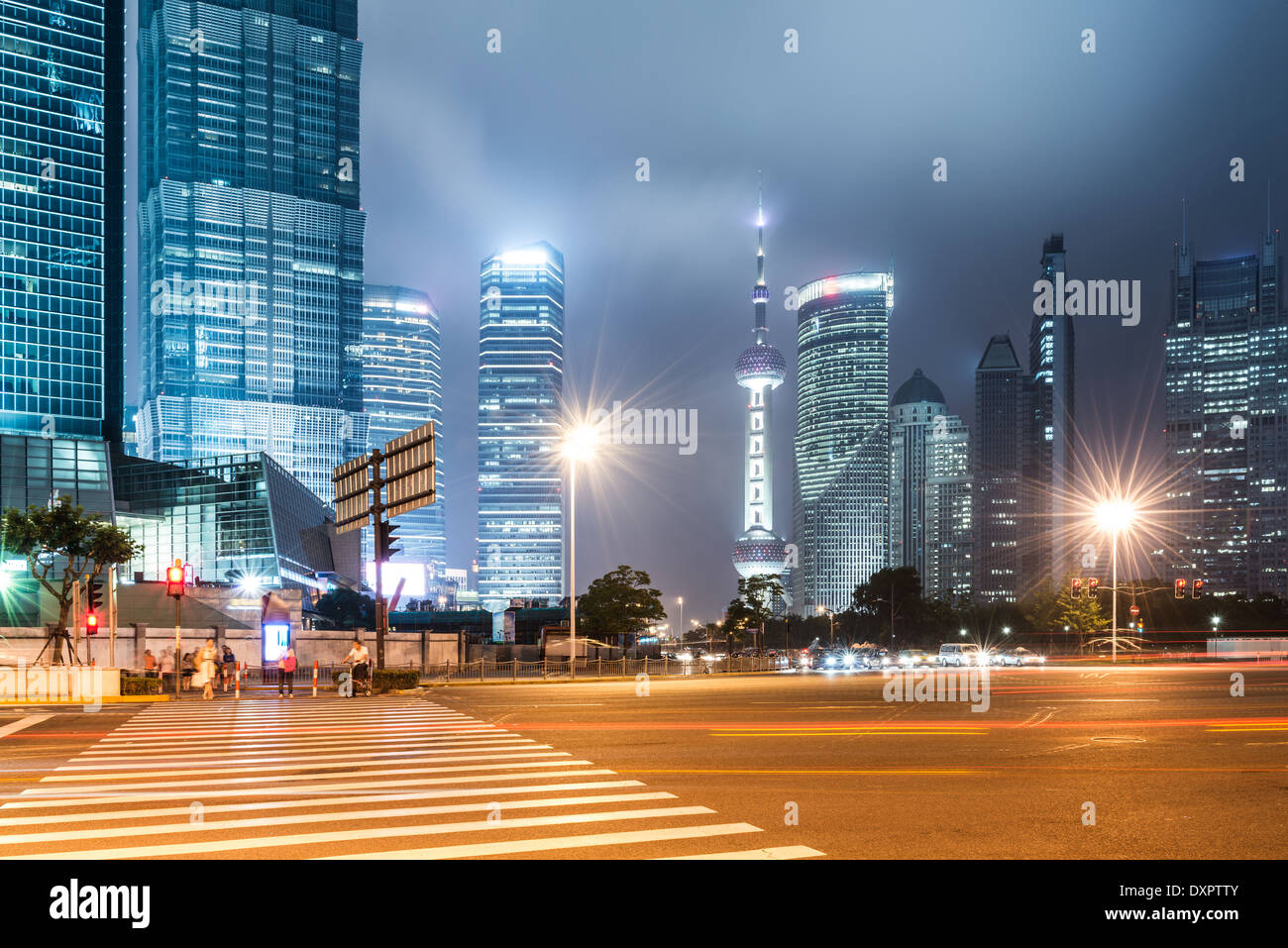The light trails on the modern building background in shanghai china ...