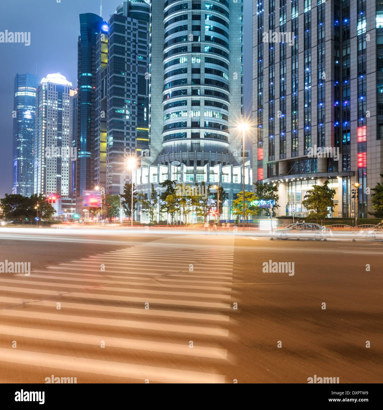 the light trails on the modern building background in shanghai china ...