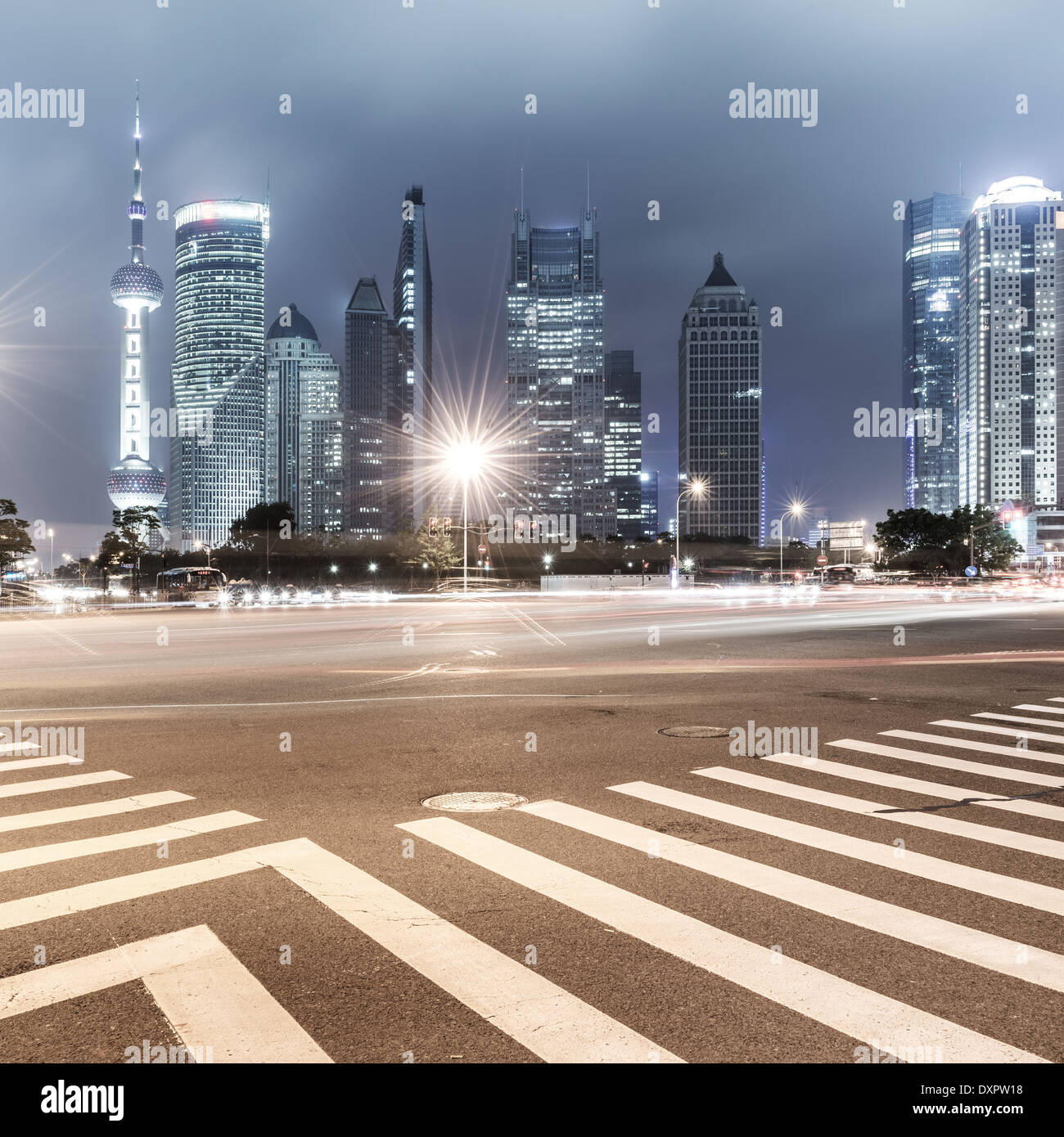 the light trails on the modern building background in shanghai china ...