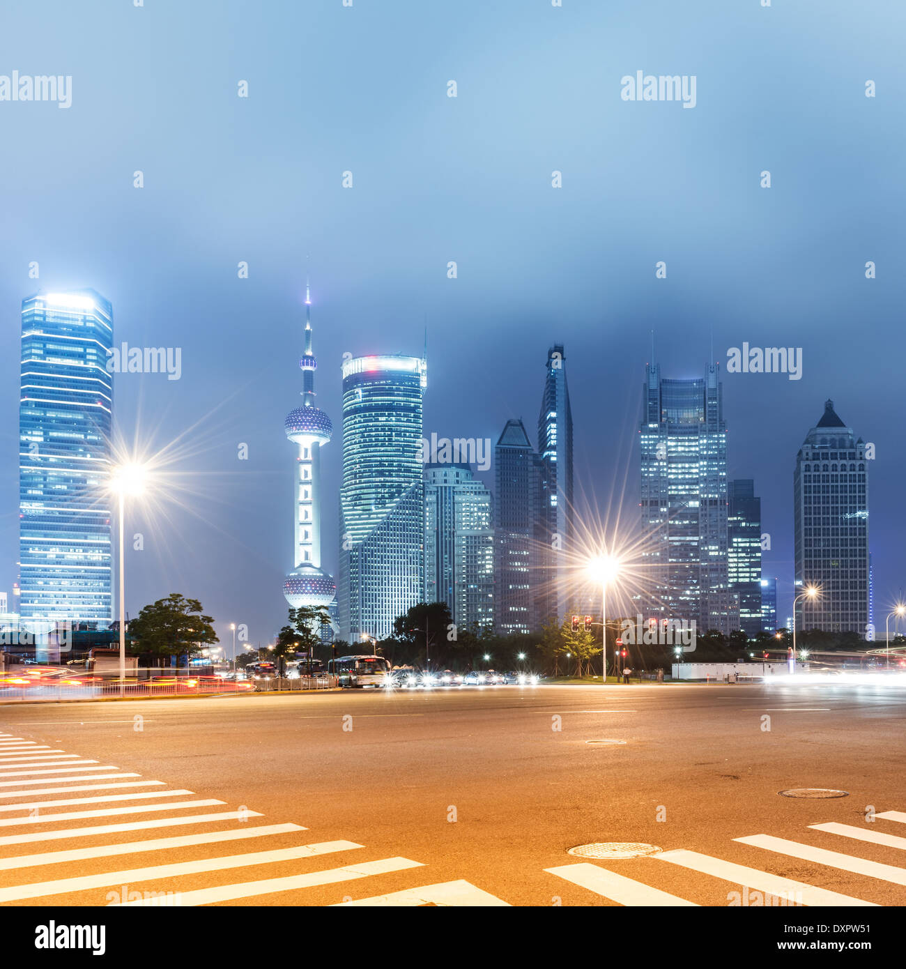 the light trails on the modern building background in shanghai china ...