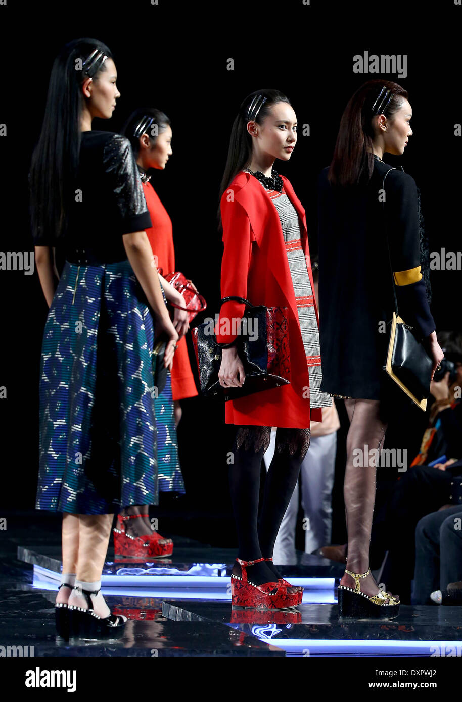 Beijing, China. 28th Mar, 2014. Models present creations designed by Xu ...