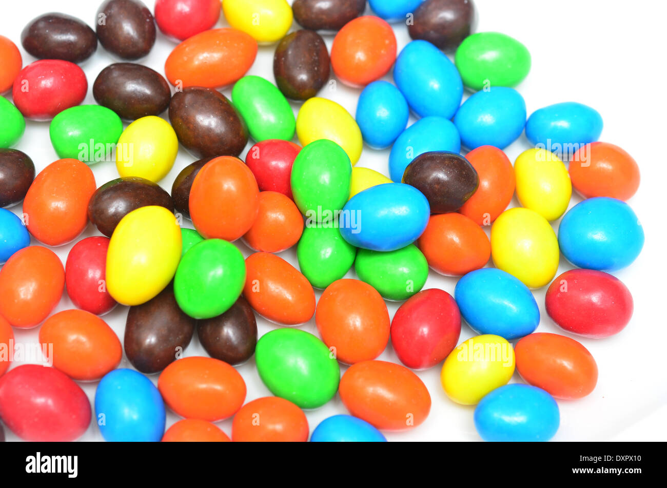 color candy beans on white Stock Photo - Alamy