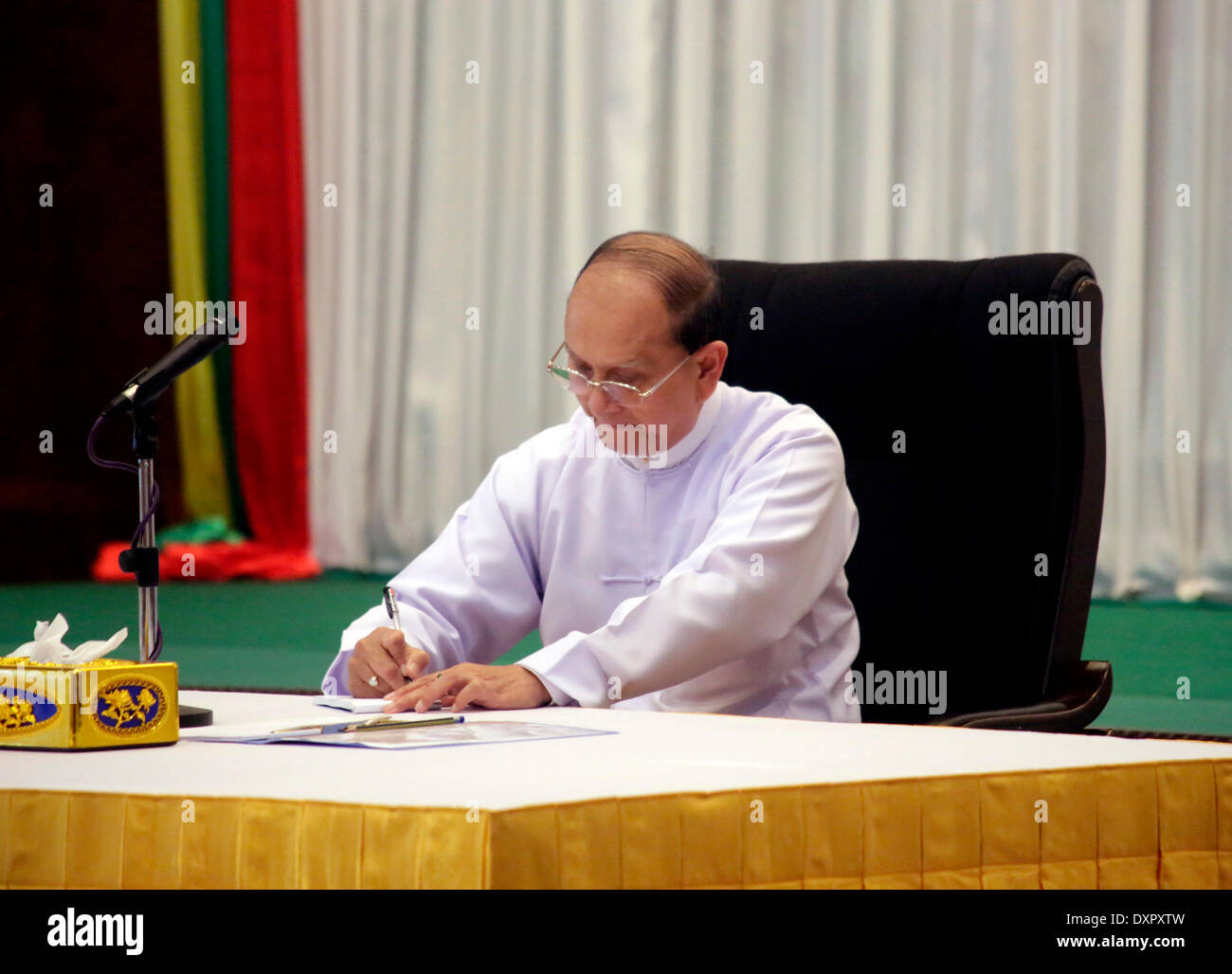 Yangon, Myanmar. 29th Mar, 2014. Myanmar's President U Thein Sein notes ...