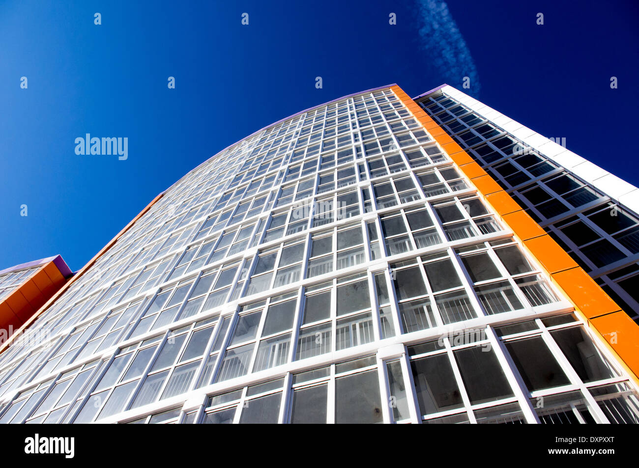 New building with a glass facade against the sky, view from below Stock ...