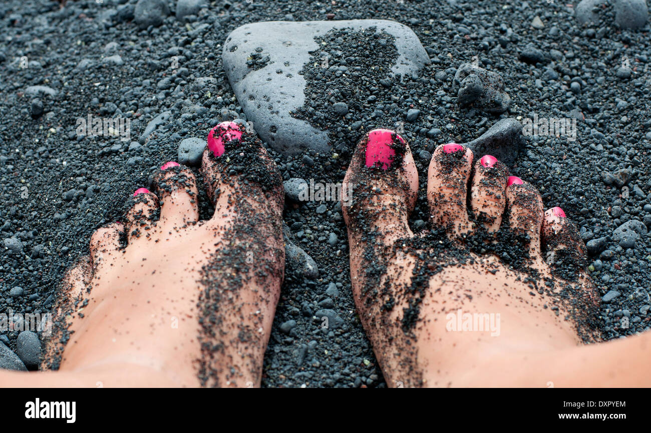 Woman's feet on the earth Stock Photo - Alamy