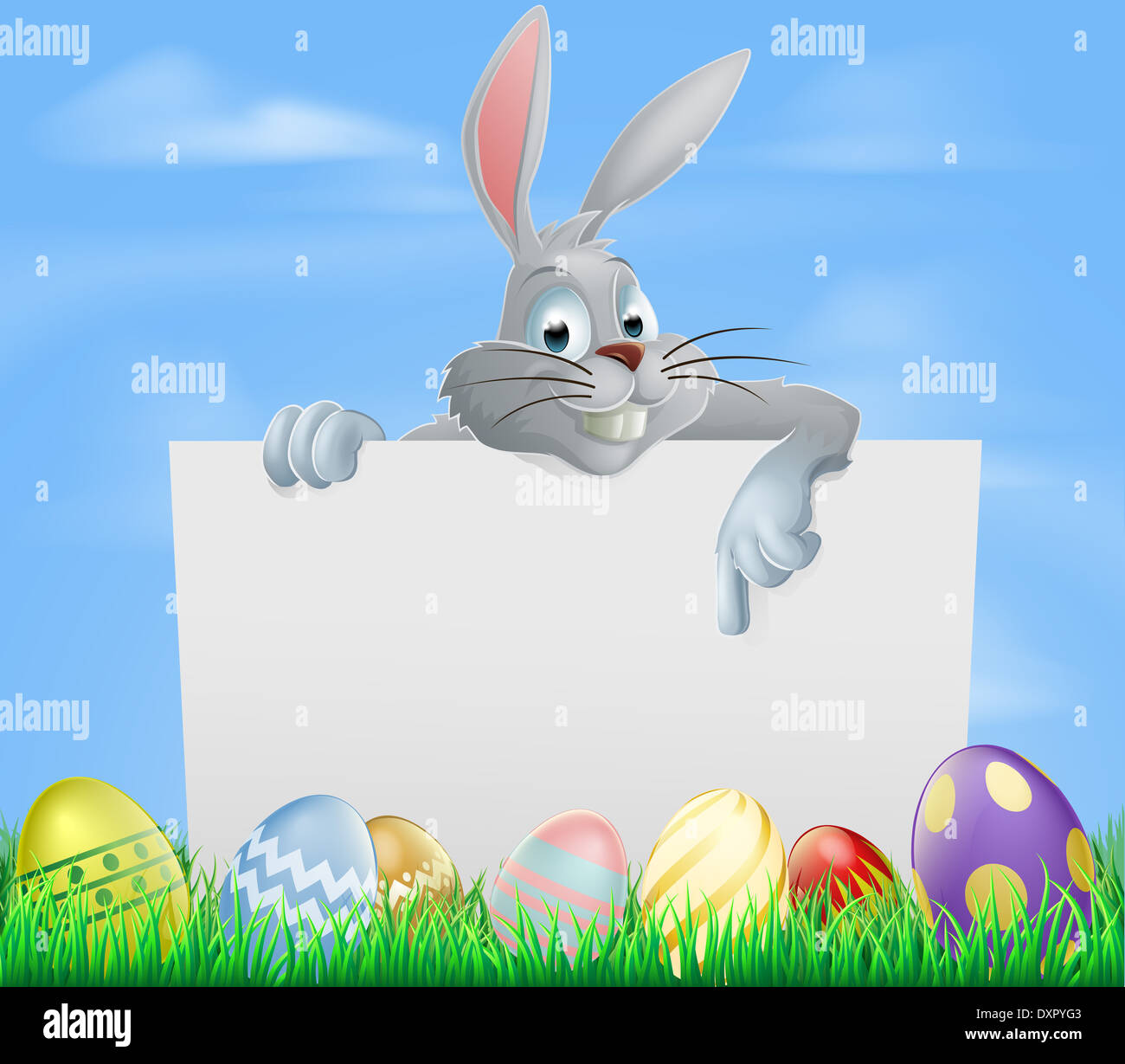 The Easter bunny pointing at a sign with Easter eggs background Stock ...