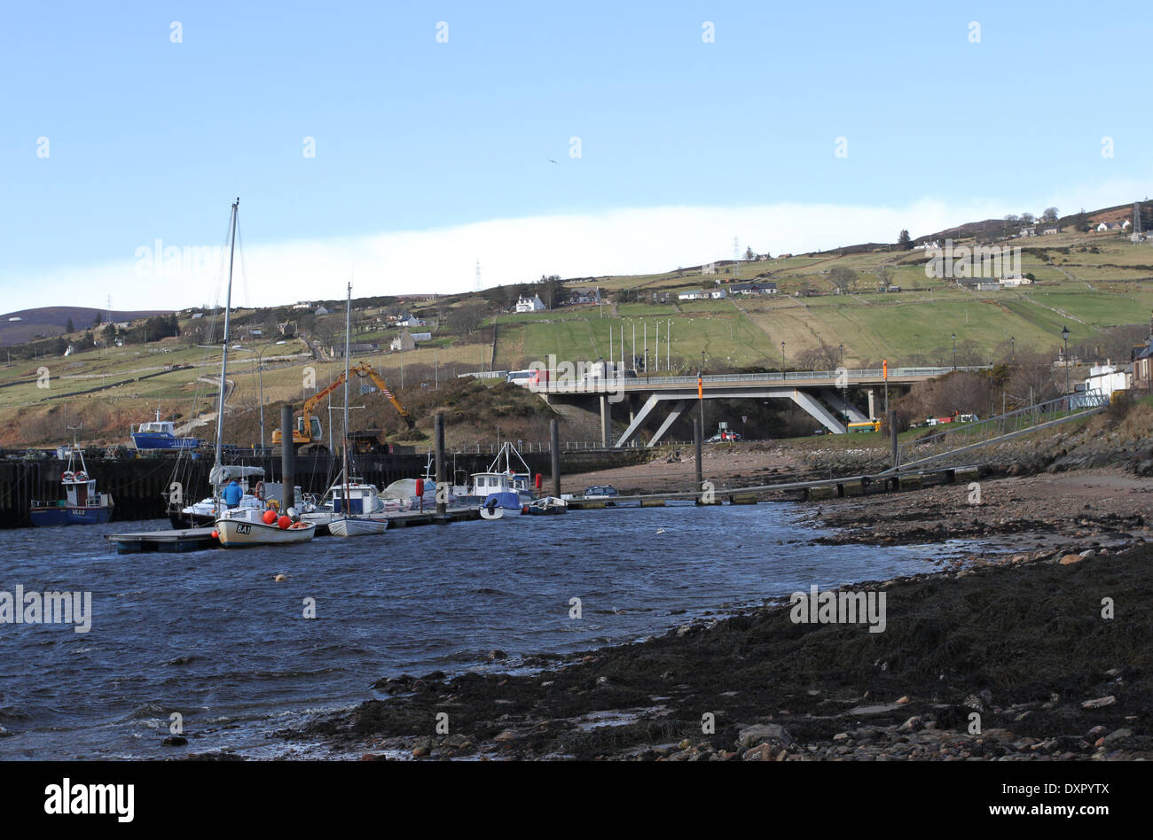 Boats in Helmsdale harbour with bridge Scotland March 2014 Stock Photo ...