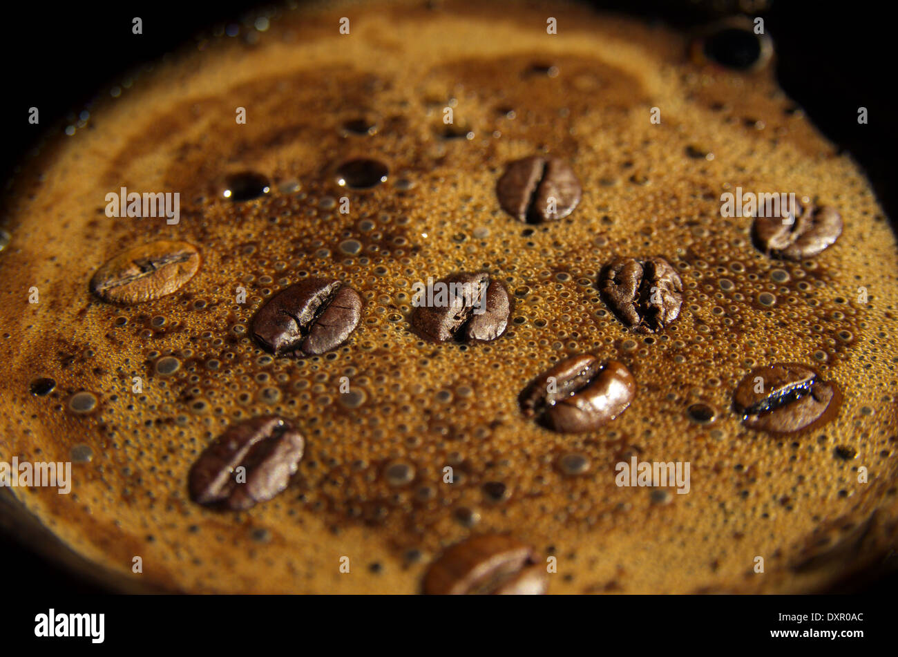 Coffee beans on the top of coffe foam Stock Photo - Alamy
