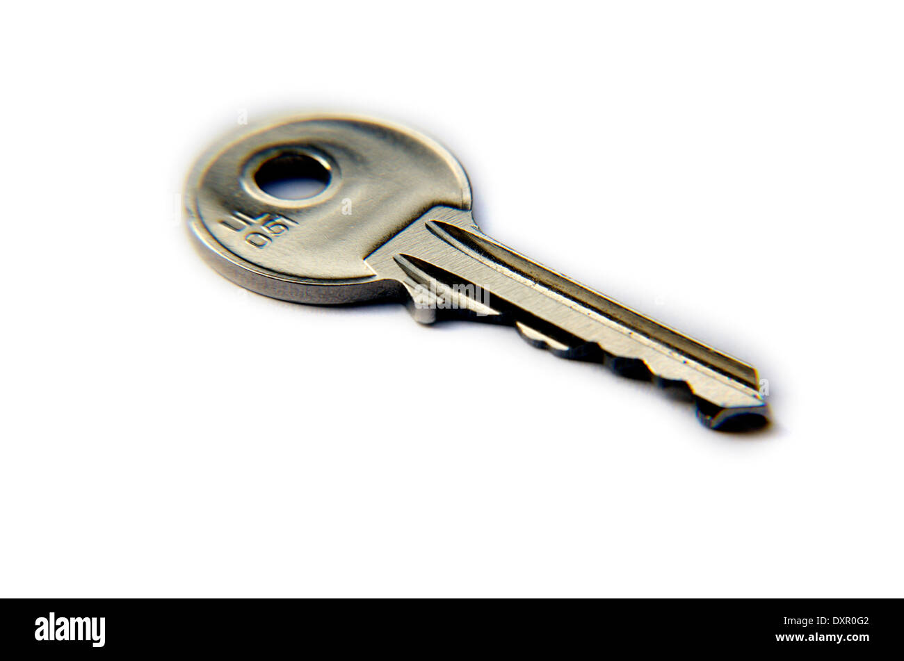 Regular silver key isolated on white background Stock Photo - Alamy