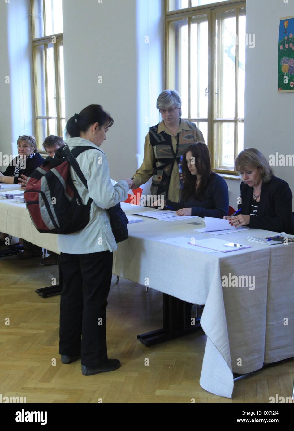 Bratislava, Slovak. 29th Mar, 2014. A voter prepares to vote at a ...