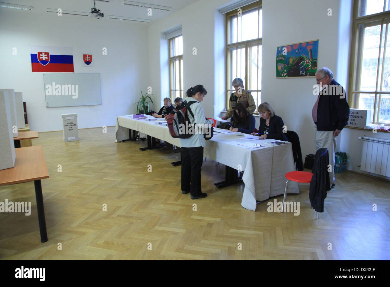 Bratislava, Slovak. 29th Mar, 2014. A voter prepares to vote at a ...