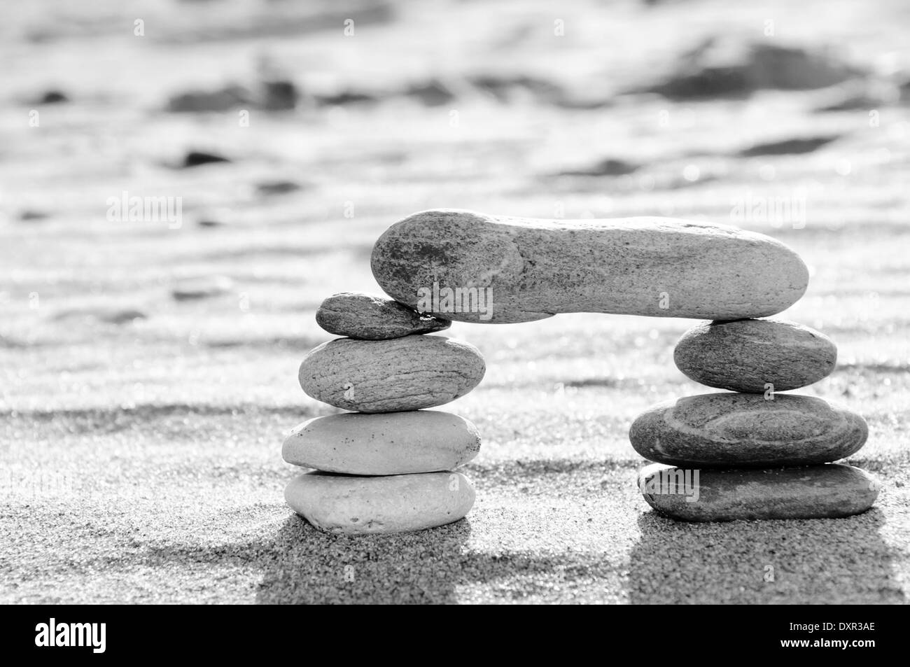 A stack of pebbles in black and white, arch shape, zen concept Stock ...