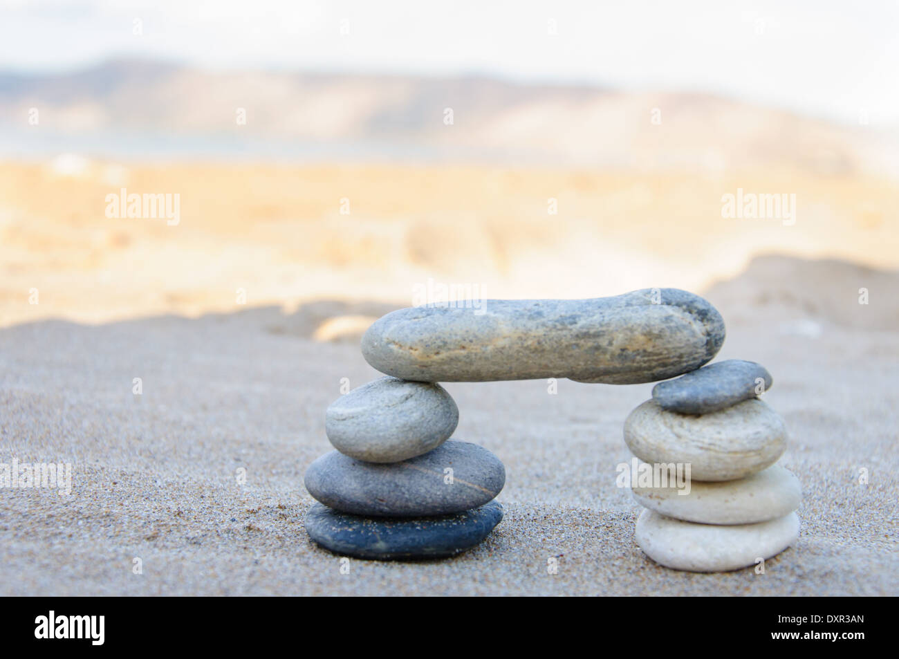 A stack of pebbles in black and white, arch shape, zen concept Stock ...