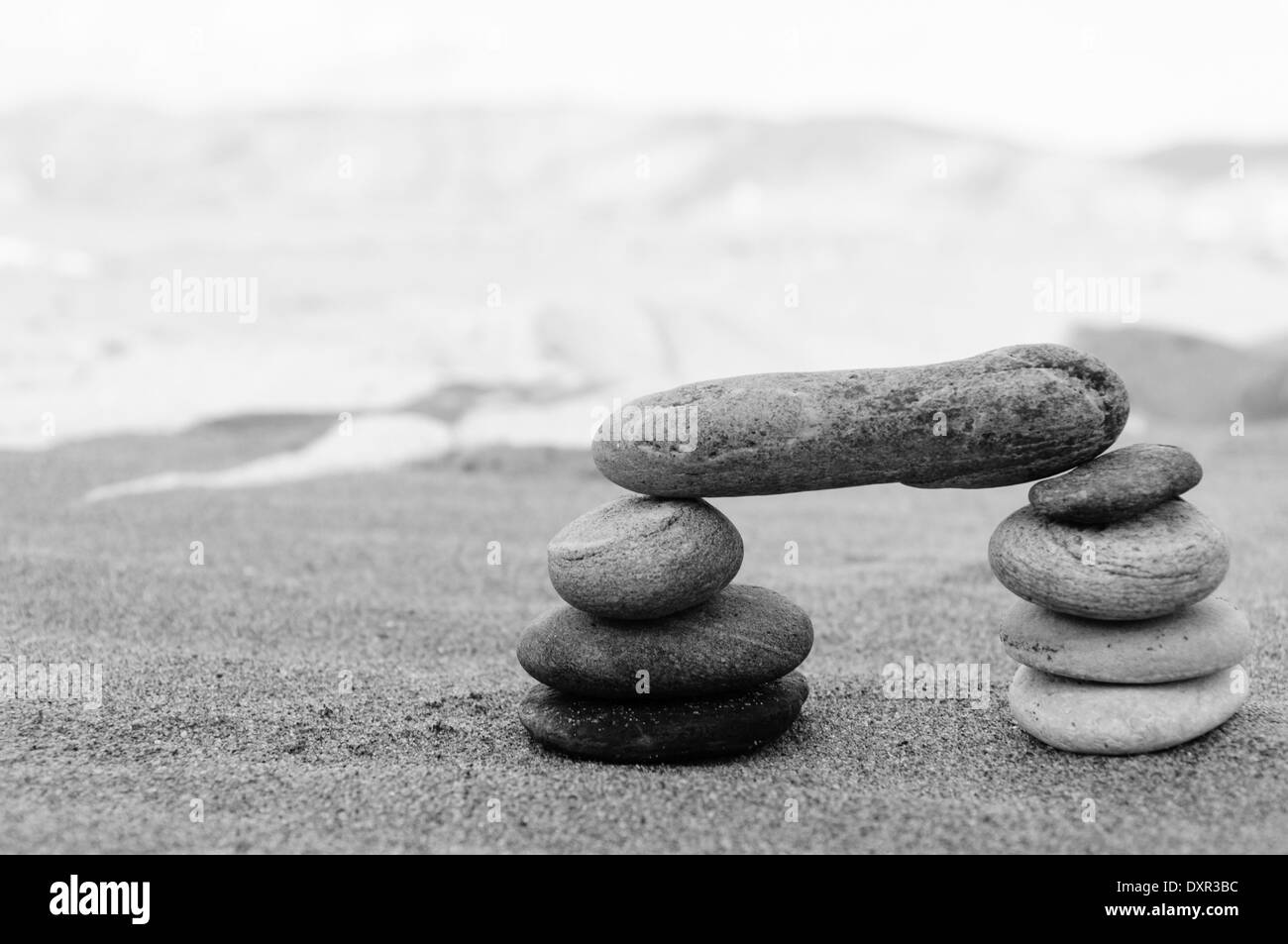 A stack of pebbles in black and white, arch shape, zen concept Stock ...