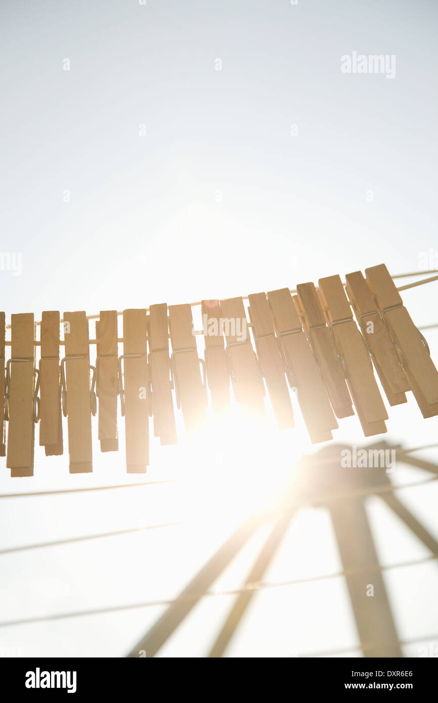 clothes pegs on a washing line Stock Photo - Alamy