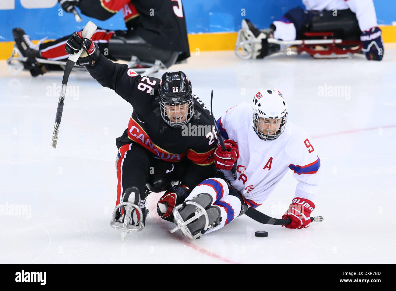 Sochi, Russia. 9th Mar, 2014. (L-R) Dominic Larocque (CAN), Morten ...