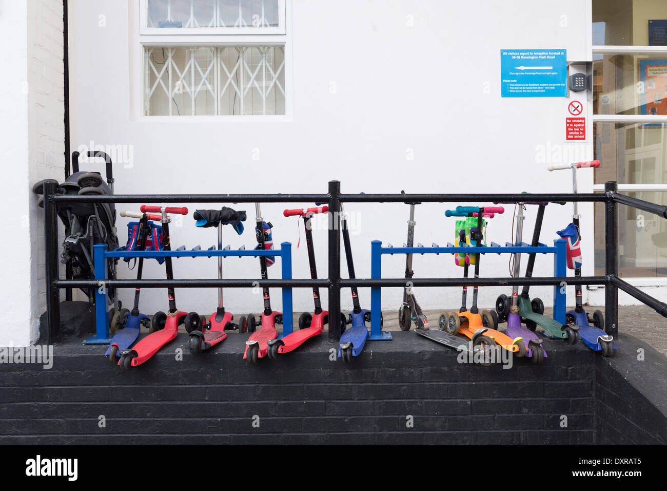 Children push scooters hi-res stock photography and images - Alamy