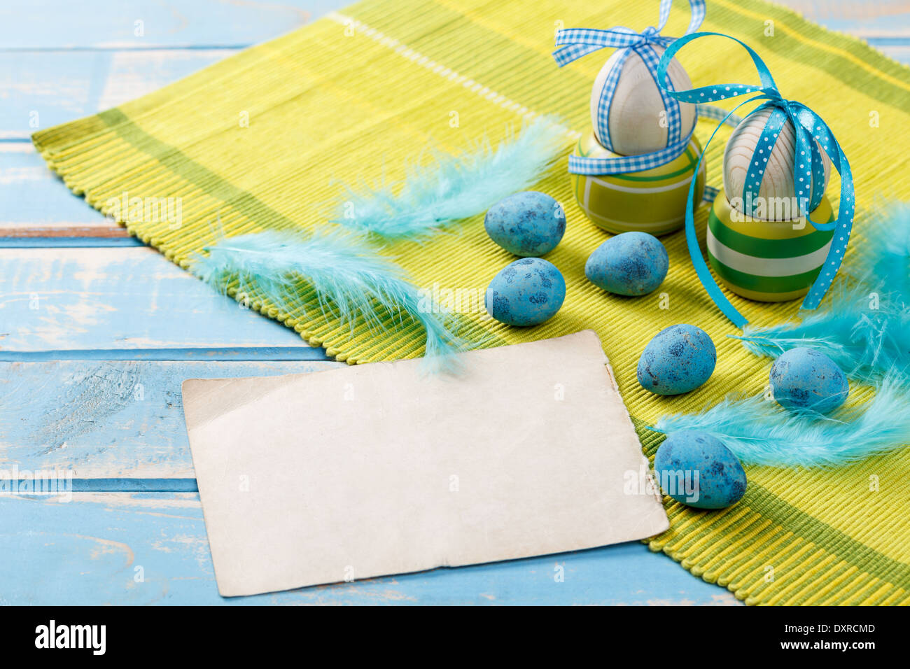Easter note paper with eggs and feather Stock Photo - Alamy