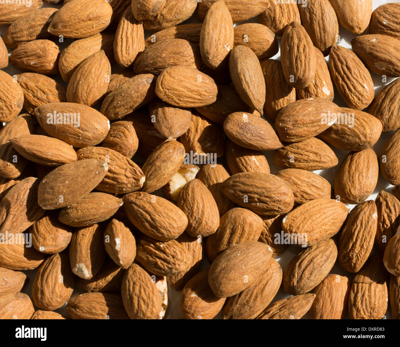 Raw almonds full frame Stock Photo - Alamy