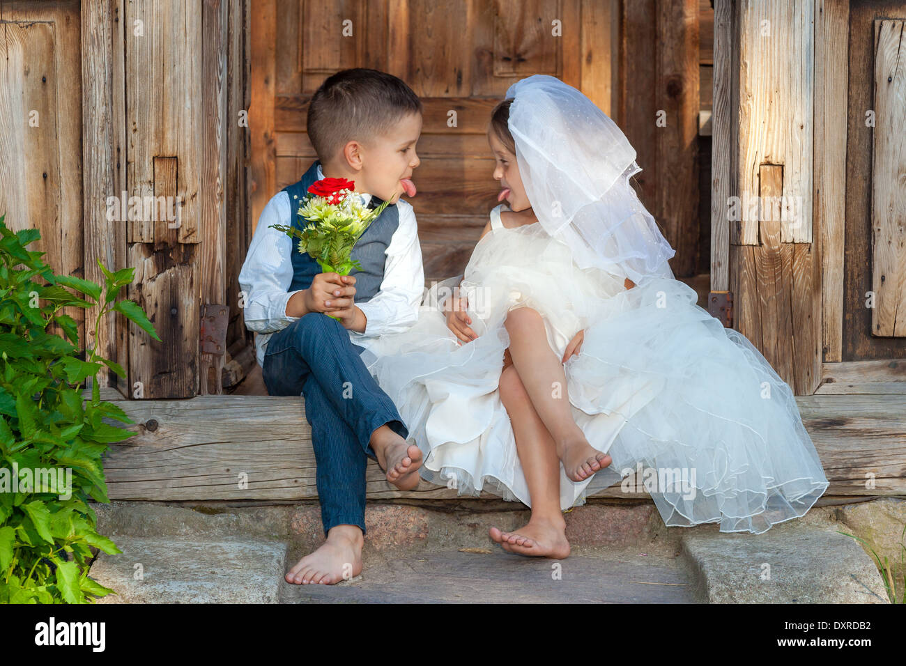 Kids Love Couple After the Wedding Stock Photo - Alamy
