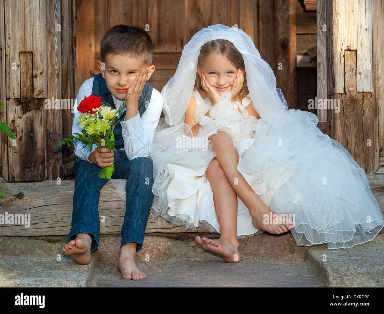 Kids Love Couple After the Wedding Stock Photo - Alamy