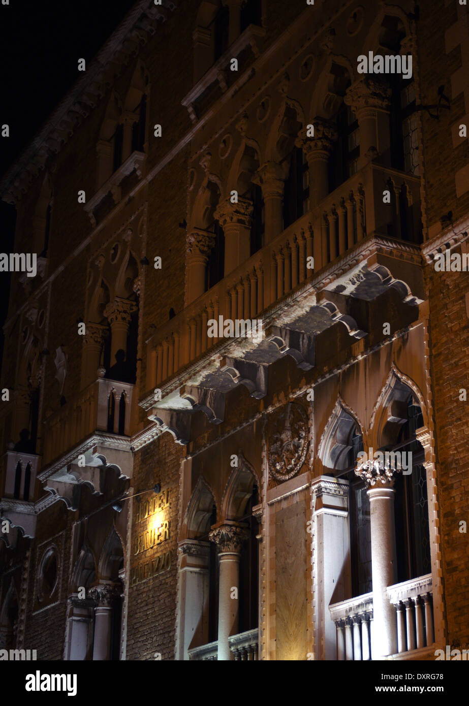 Venetian windows and balconies at the brick facade in Venice Stock ...