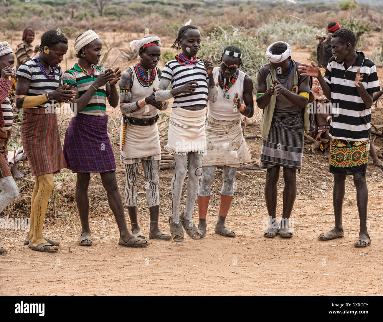 Hamer men dancing at a bull jumping ceremony near Turmi in the Omo ...