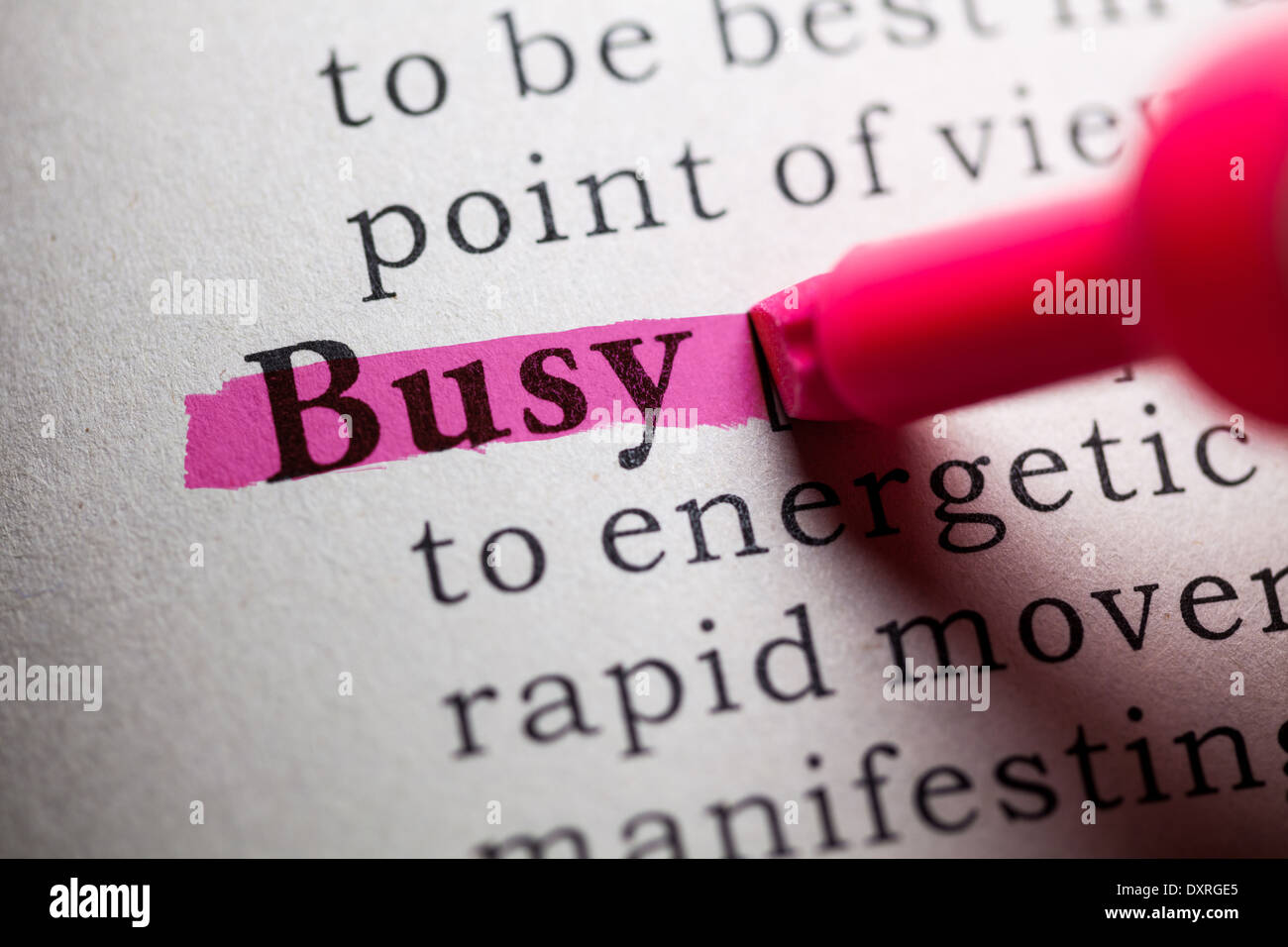 Fake Dictionary, definition of the word busy Stock Photo - Alamy