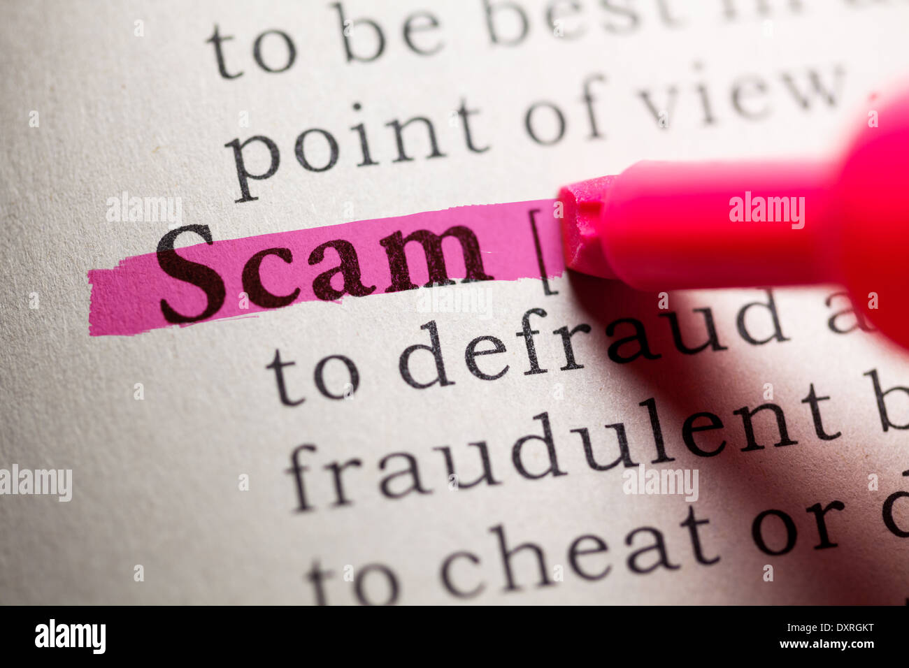 Fake Dictionary, definition of the word scam Stock Photo - Alamy