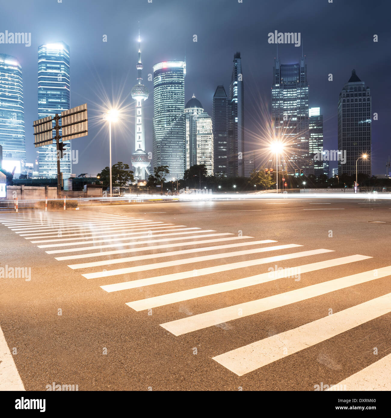 the light trails on the modern building background in shanghai china ...