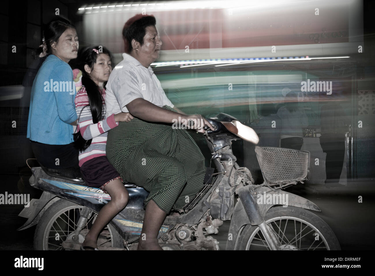 Myanmar, Tangoo, Women on motorcycle Stock Photo - Alamy