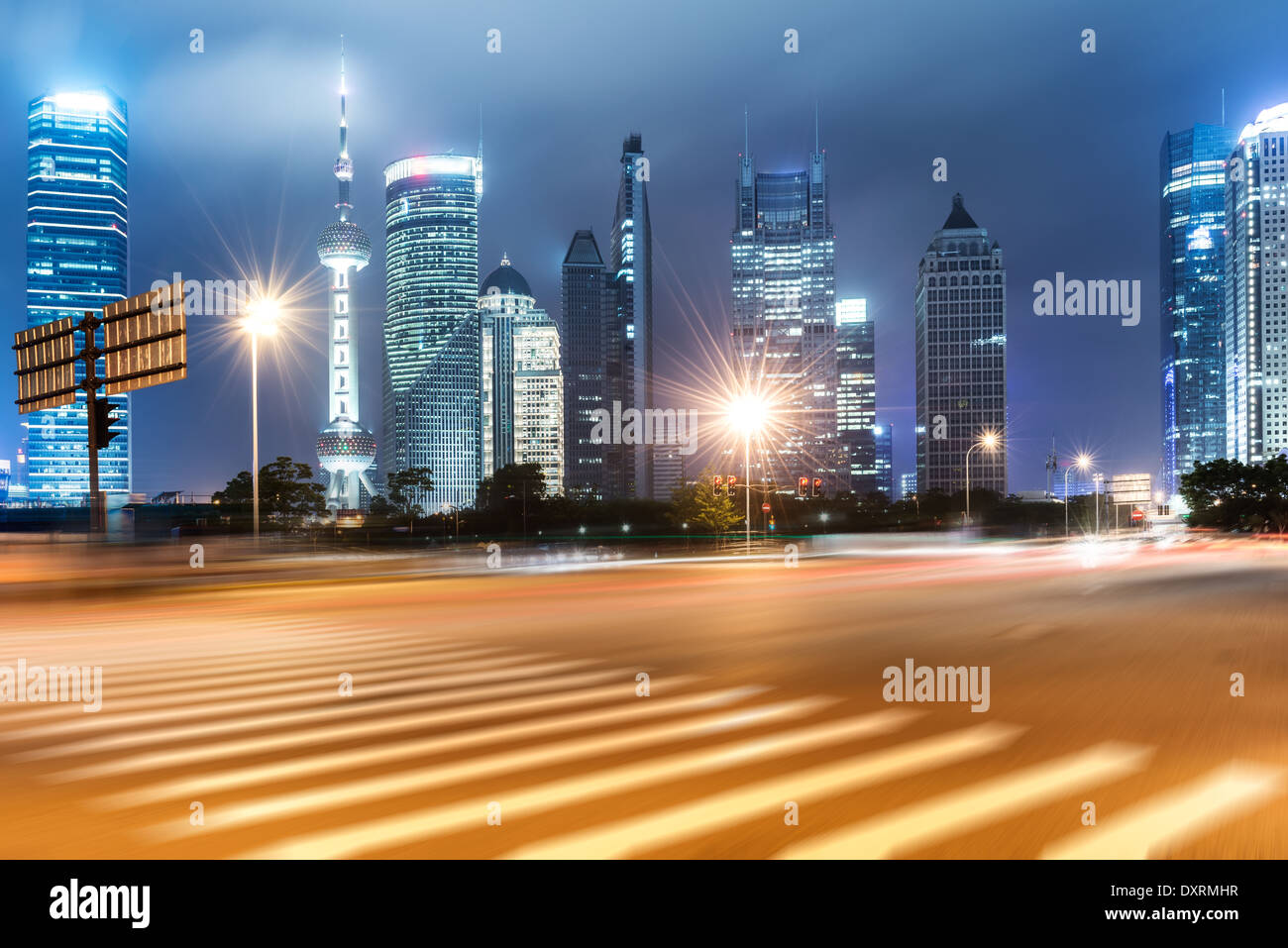 the light trails on the modern building background in shanghai china ...