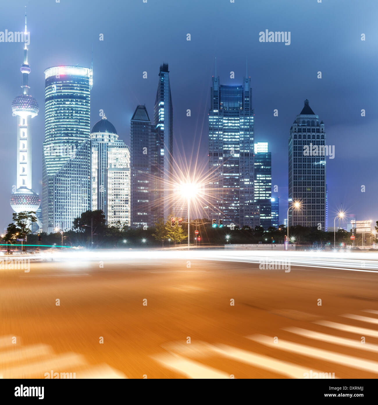the light trails on the modern building background in shanghai china ...