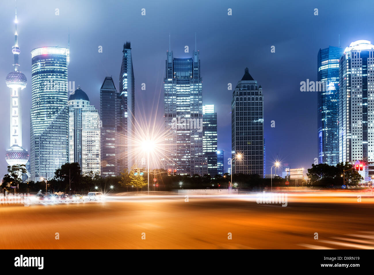 the light trails on the modern building background in shanghai china ...