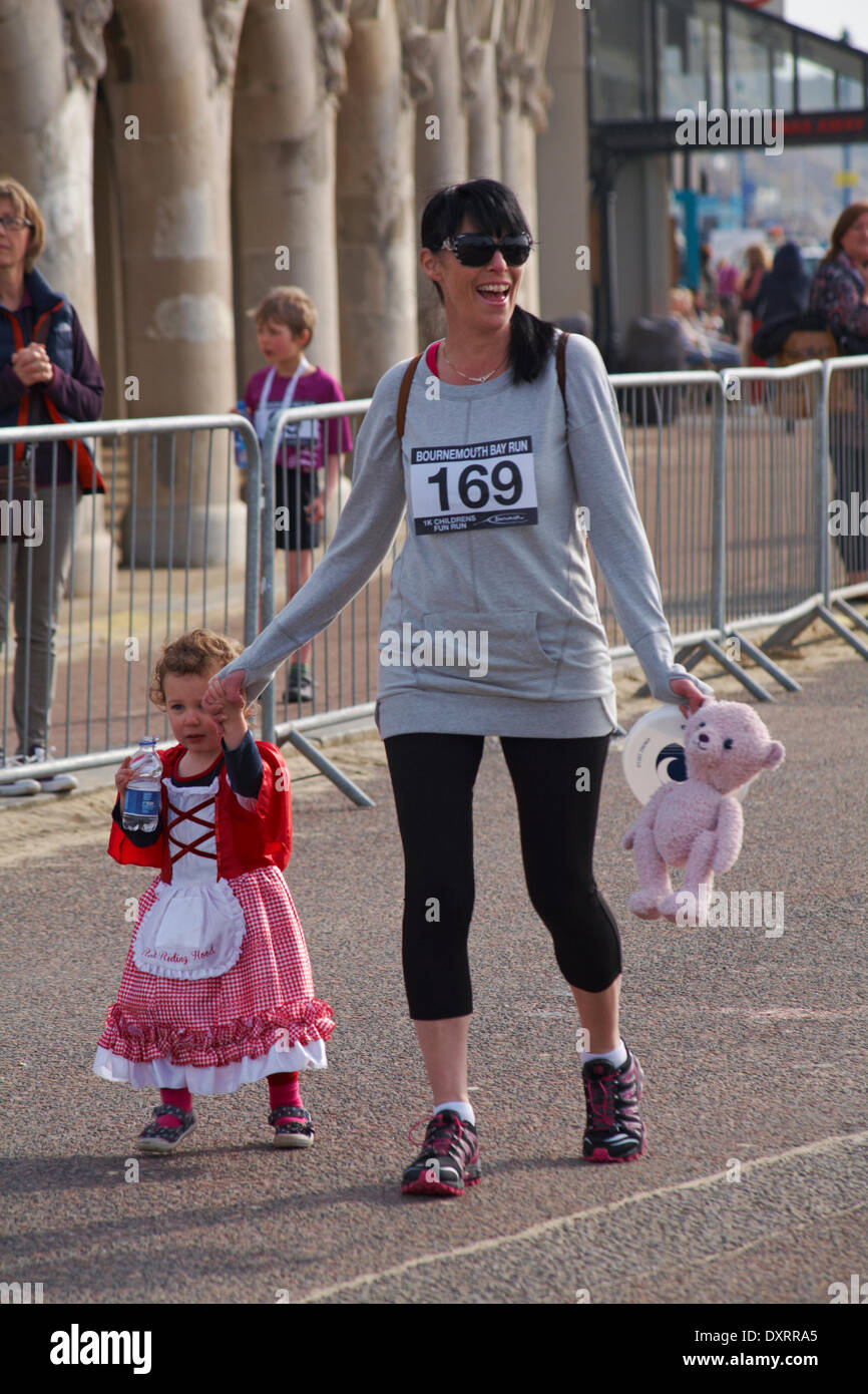 Bournemouth, UK 30 March 2014. Children make their mum proud by taking ...