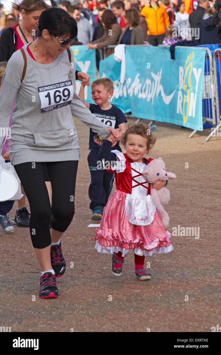 Bournemouth, UK 30 March 2014. Children make their mum proud by taking ...