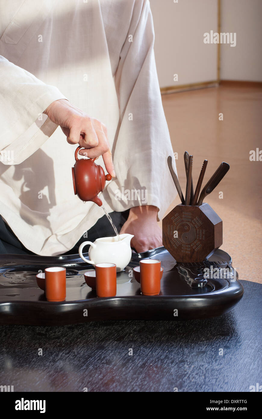 Chinese tea ceremony is perfomed by tea master in kimono Stock Photo ...