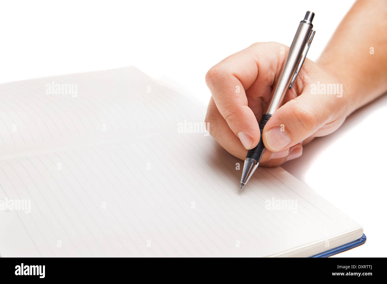 Man hand writing in open book isolated on white background Stock Photo ...