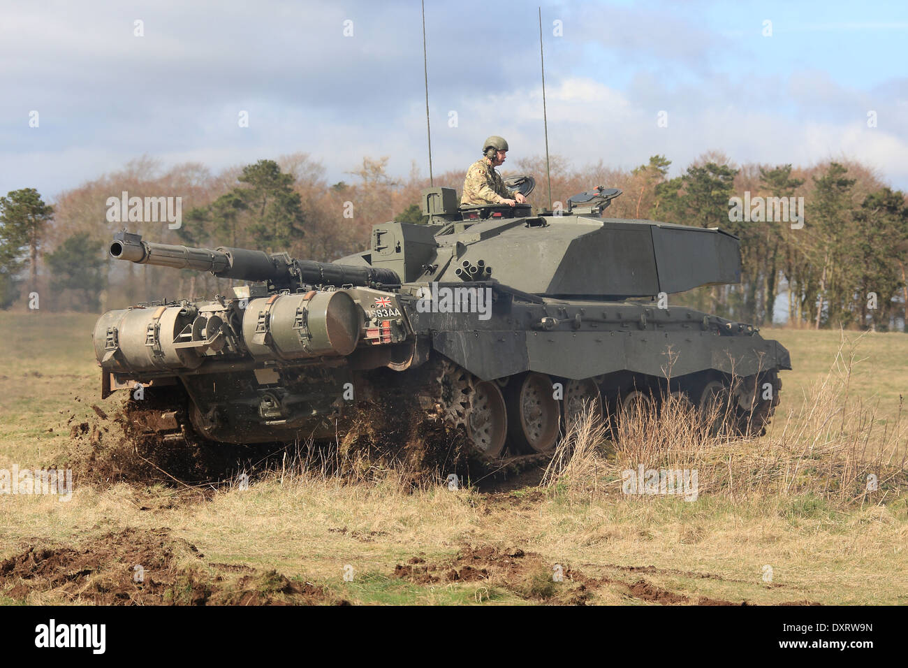 Challenger 2 battle tank travels cross country during maneuvers on ...