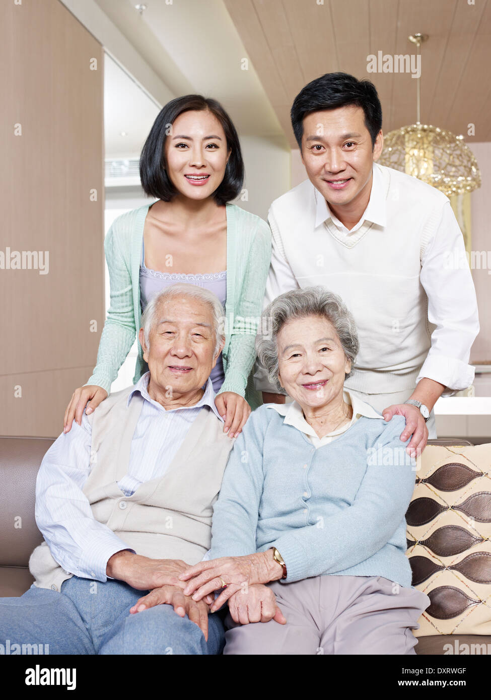 Asian family father mother children hi-res stock photography and images ...
